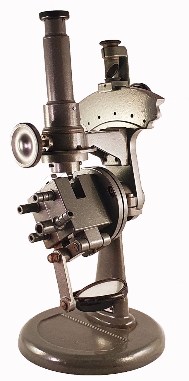 A close-up of a microscopeDescription automatically generated with ...